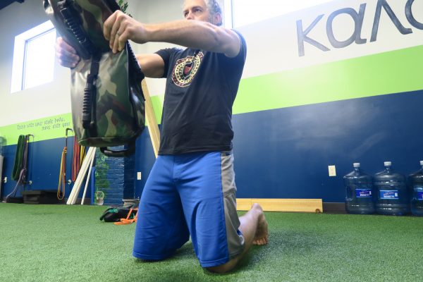 Get A Iron Grip with Ultimate Sandbag Exercises - Ultimate Sandbag Training