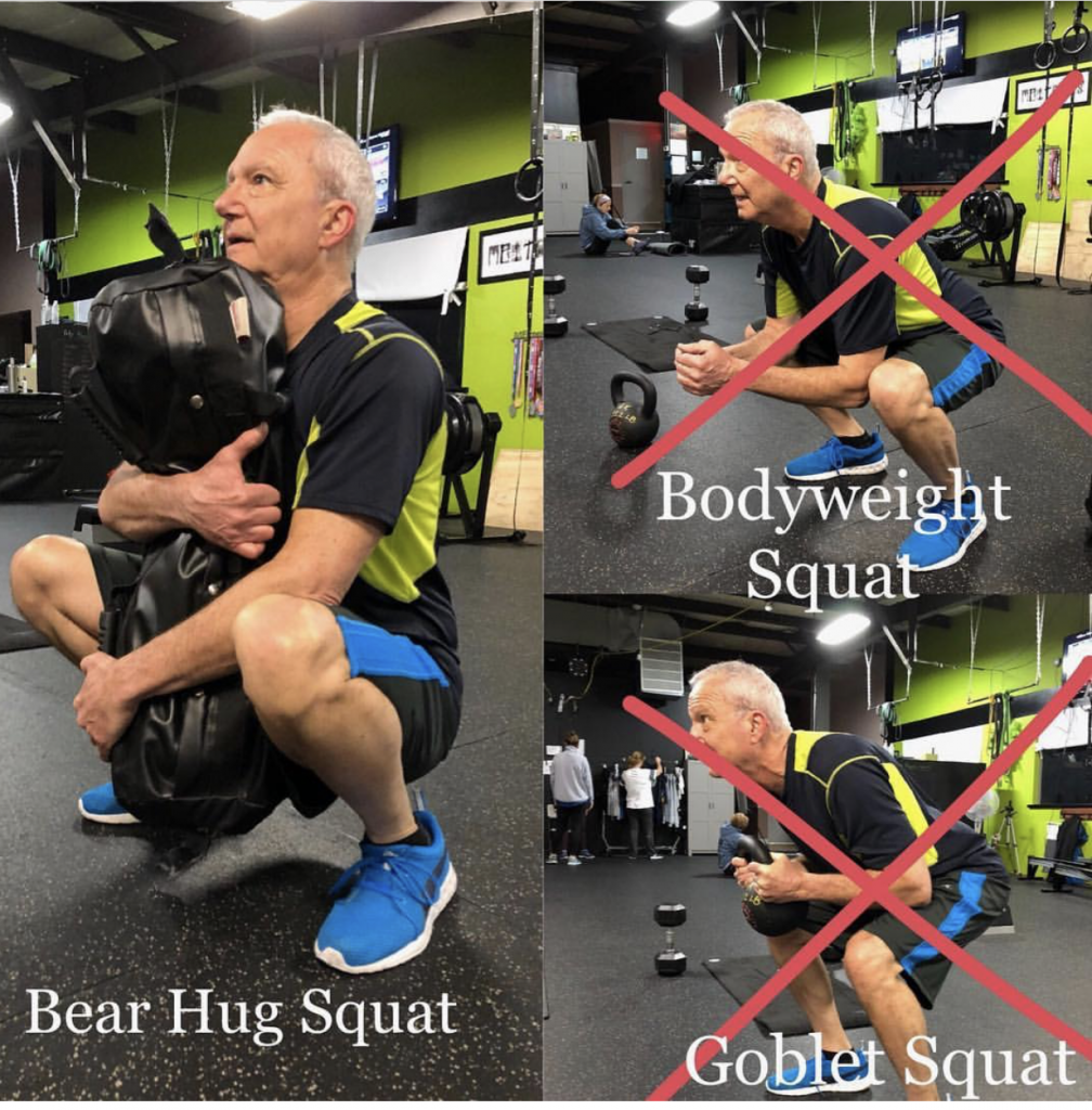 The Better Squat For Strength, Muscle, & Mobility - Ultimate Sandbag ...